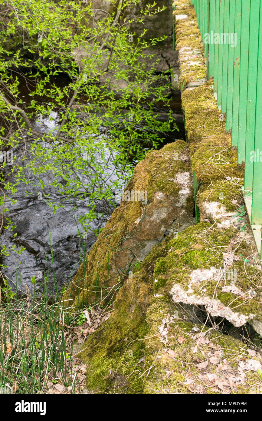 old stone bridge with green moss. River and bridge Stock Photo - Alamy