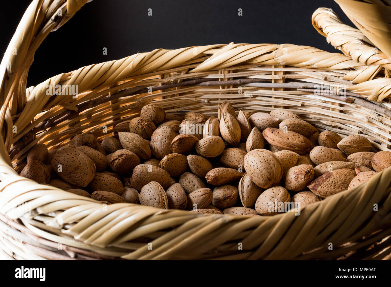 Fresh Organic Raw Almonds with Shell in Basket. Organic Food Stock ...