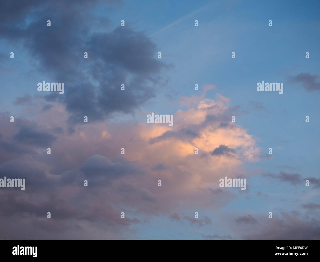 red blue sky with clouds at sunset useful as a background Stock Photo ...