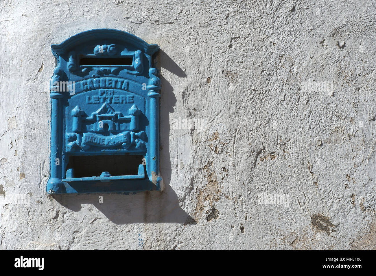 Old vintage metal mailbox on the white wall of the house Stock Photo ...