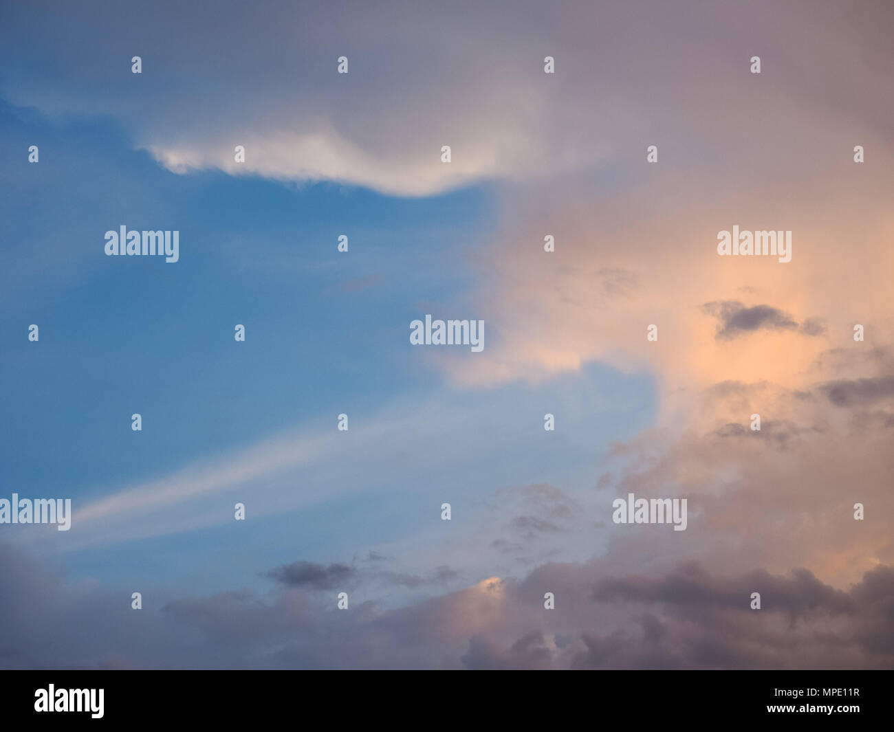 red blue sky with clouds at sunset useful as a background Stock Photo ...