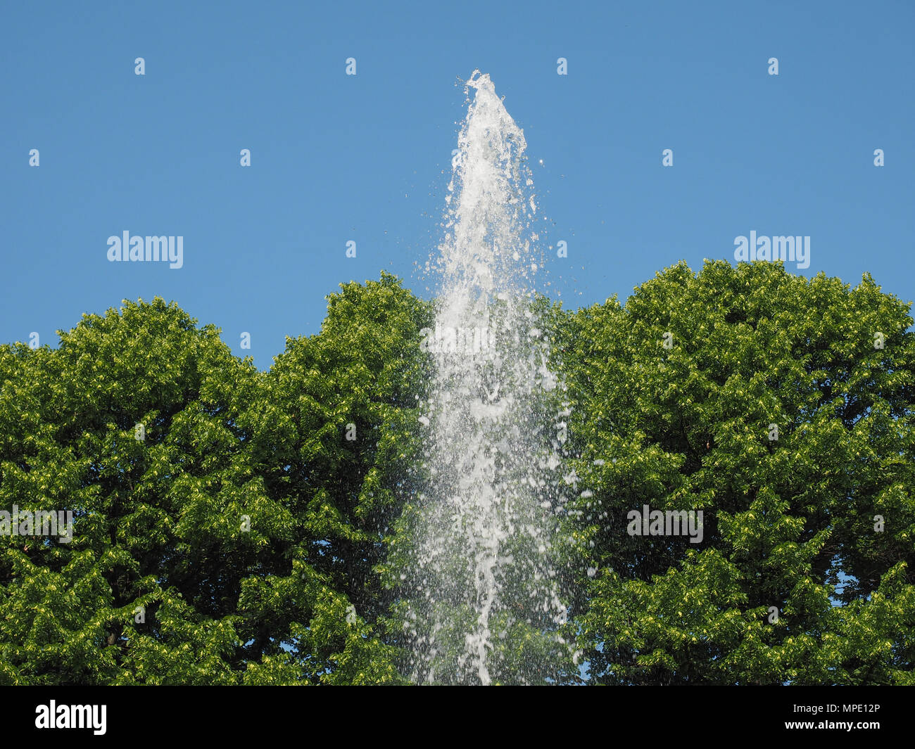 fountain jet of water high in the sky, high shutter speed freeze motion ...