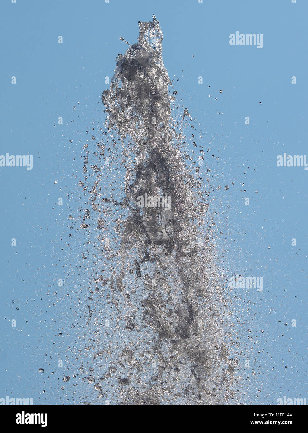 fountain jet of water high in the sky, high shutter speed freeze motion ...