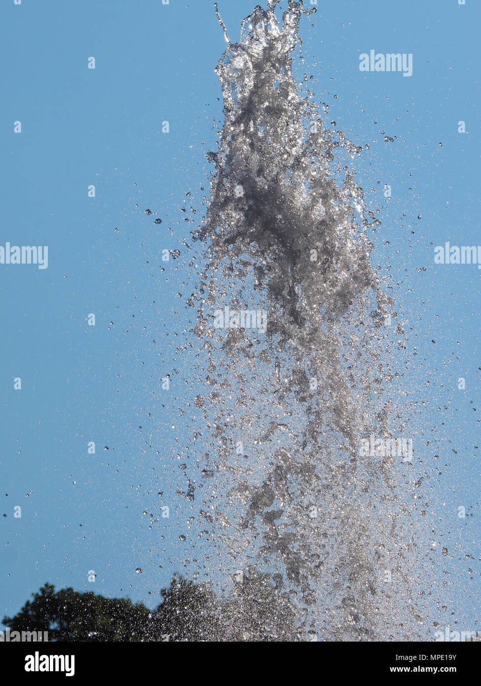 fountain jet of water high in the sky, high shutter speed freeze motion ...