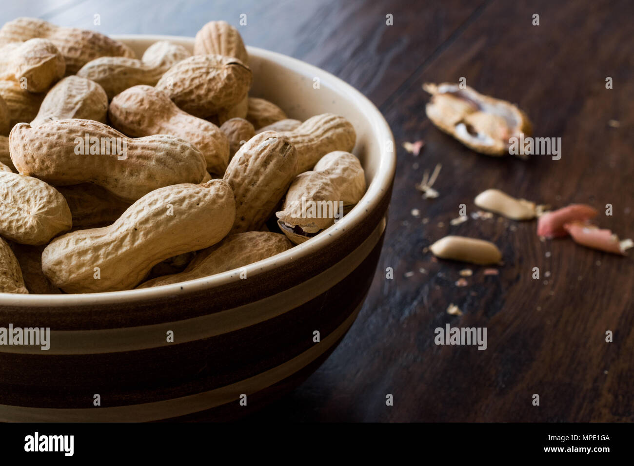 Salted roasted peanuts hi-res stock photography and images - Alamy