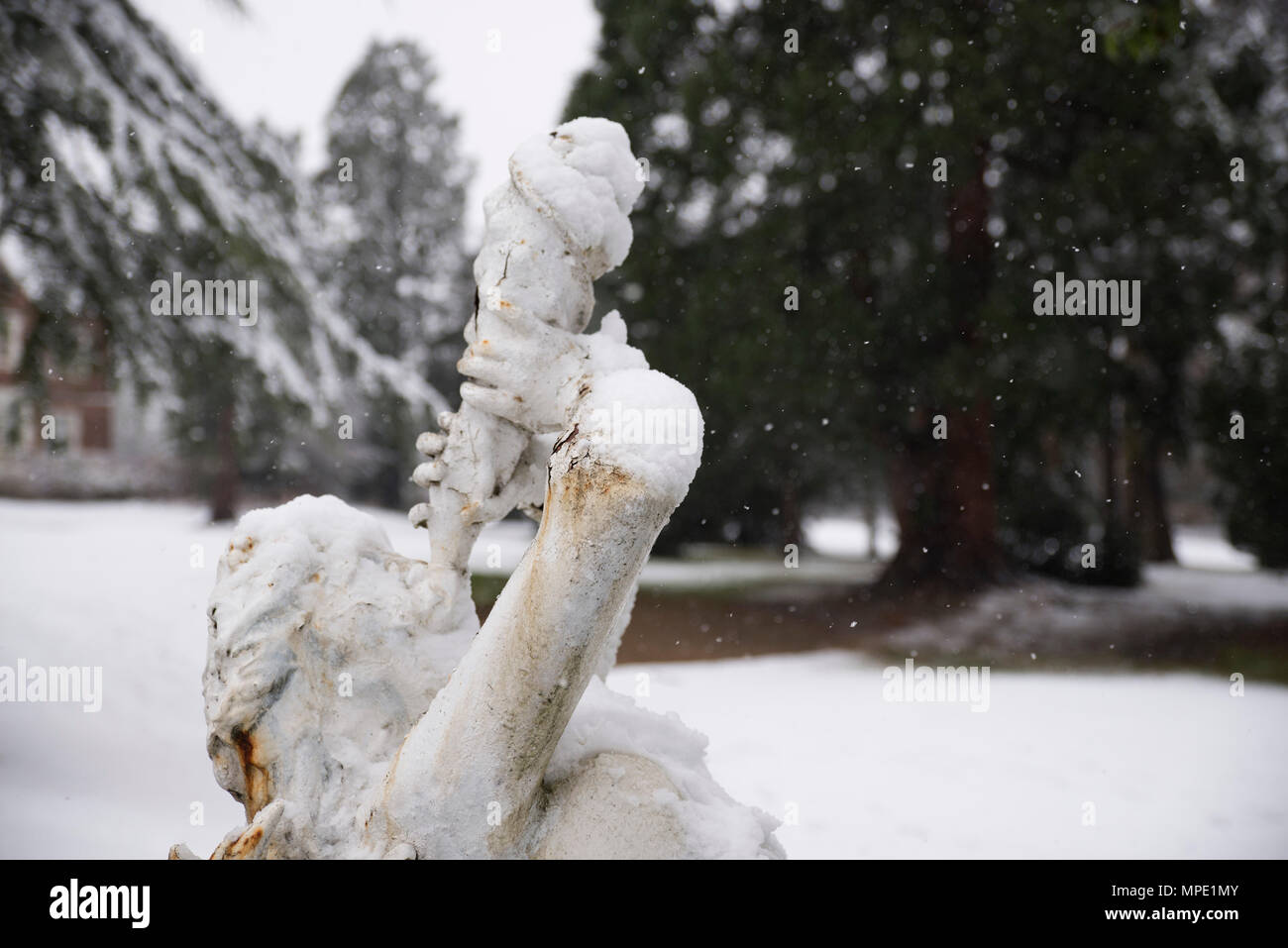 Statue coated in snow - Dollis Brook, London Stock Photo - Alamy