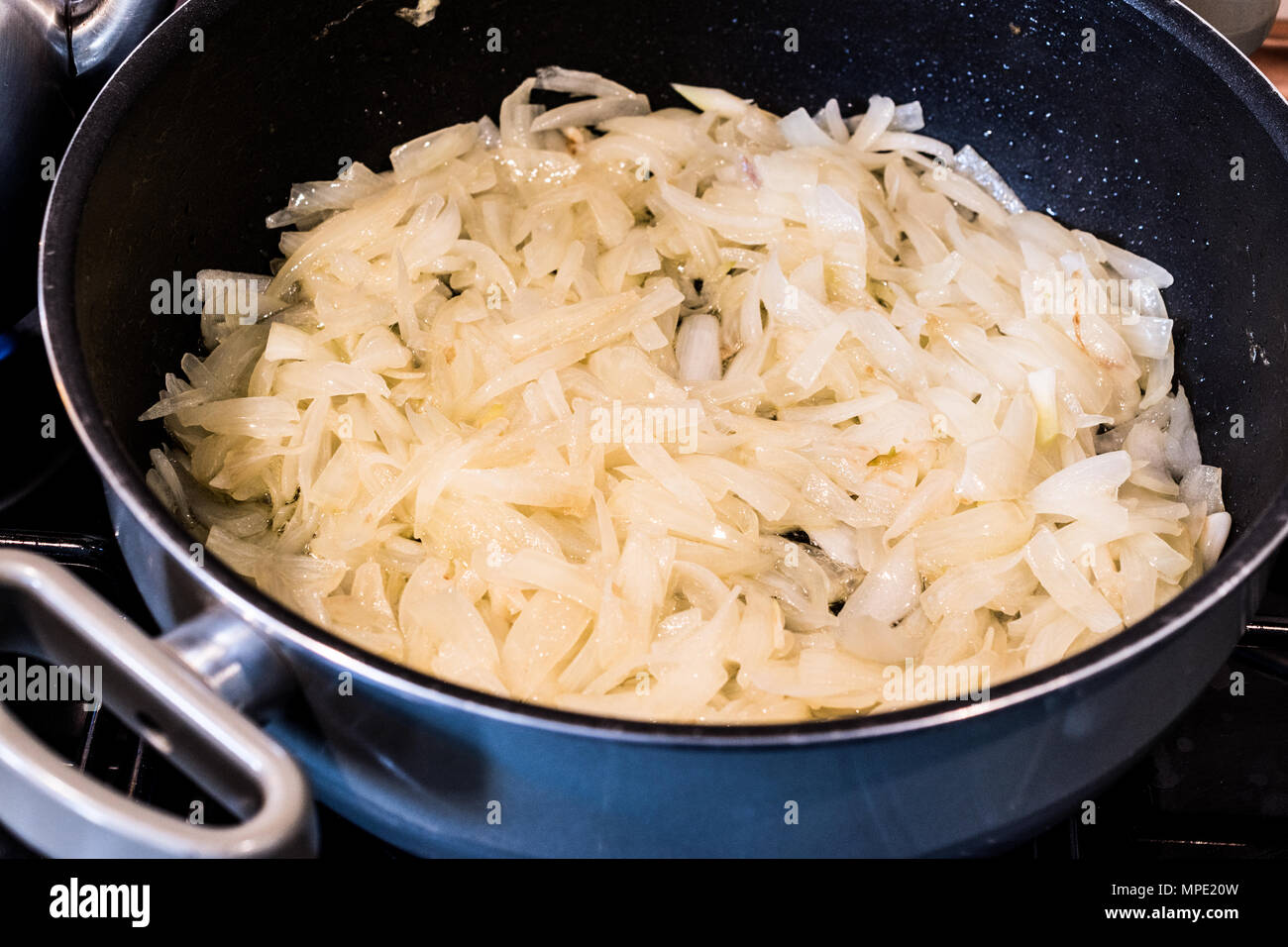 Chopped onions frying in oil hi-res stock photography and images - Alamy