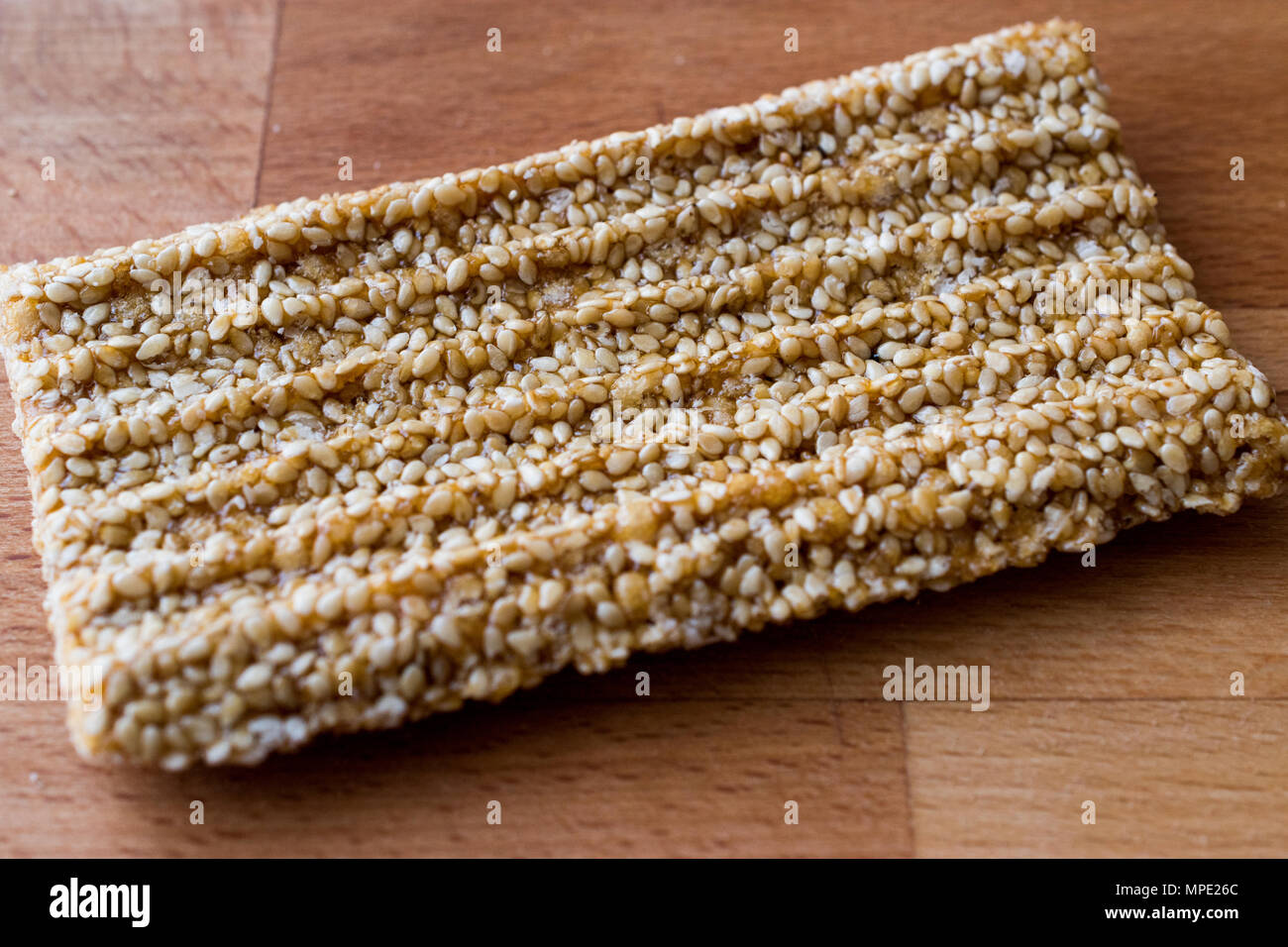 Energy bar with sesame and croquant. Protein Bar Stock Photo - Alamy