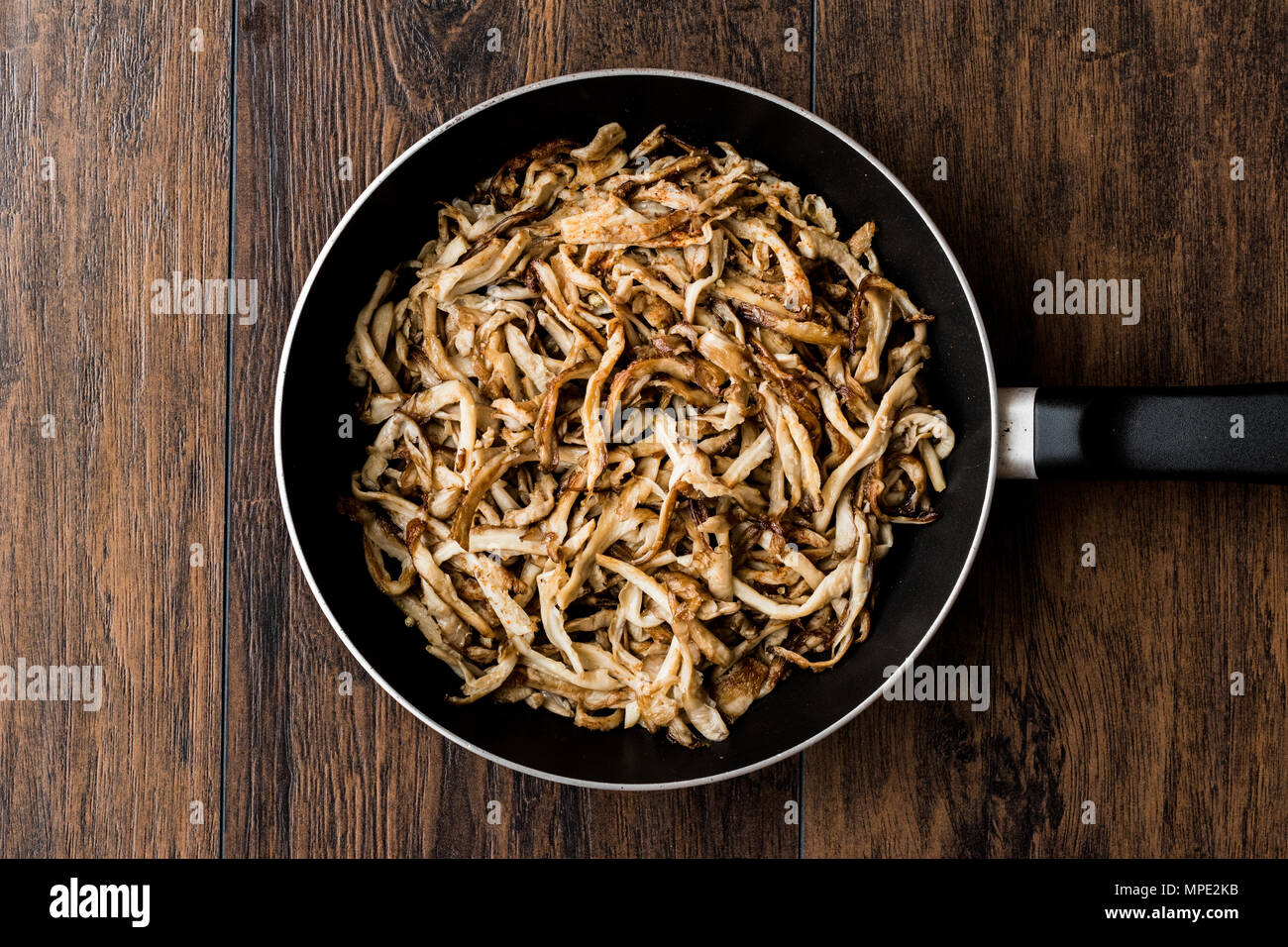 Beech mushroom in pan / Clamshell. Organic Food Stock Photo - Alamy
