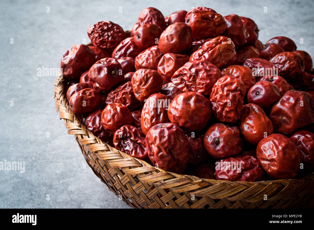 Red Jujube Fruits in Wooden Basket. Organic Food Stock Photo - Alamy