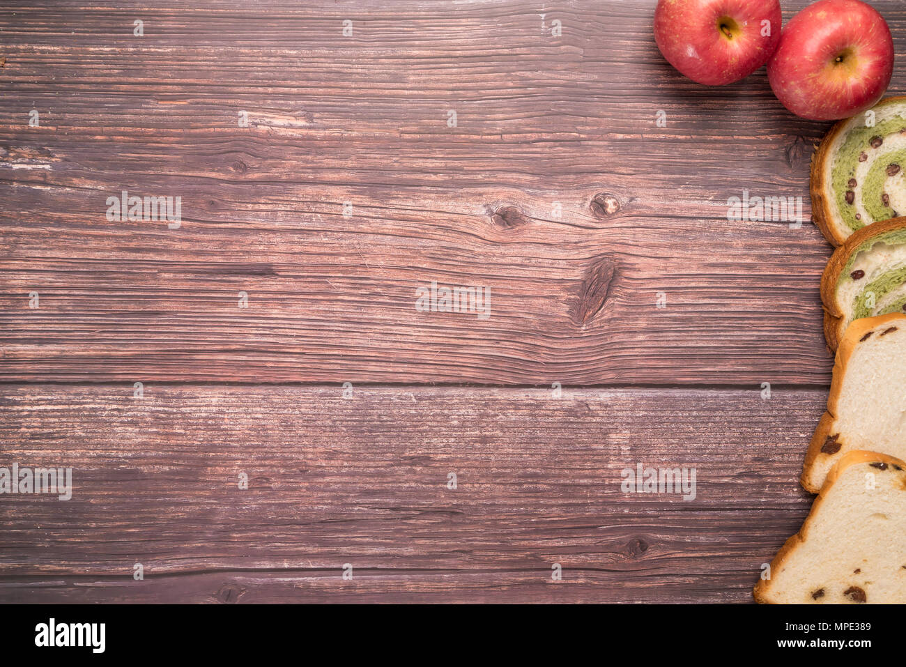 red bean and raisin bread with red apple composition backgrounds on ...