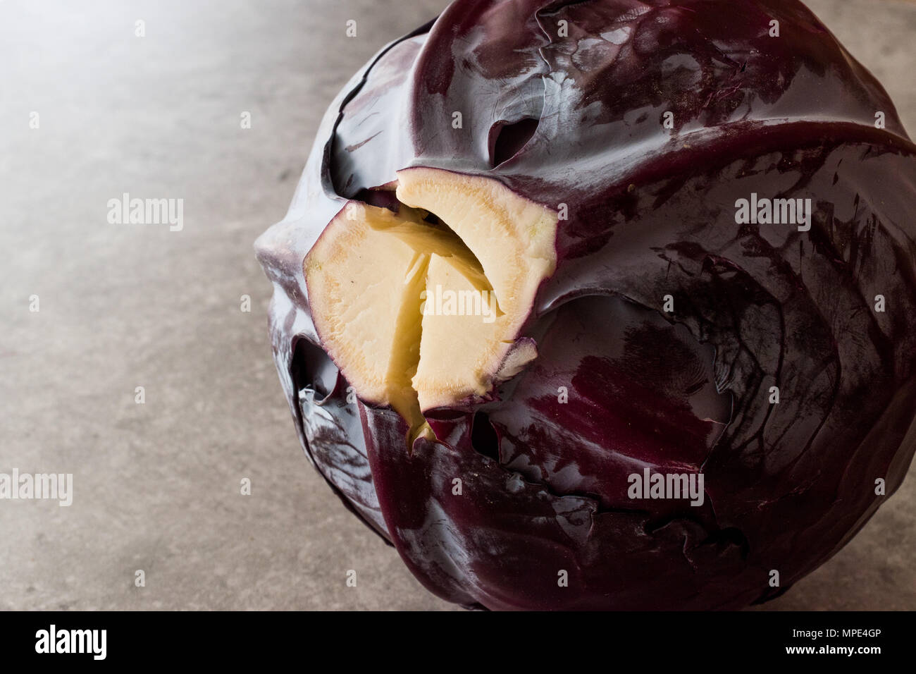 Whole Red Cabbage on Grey Surface. Organic Food Stock Photo - Alamy