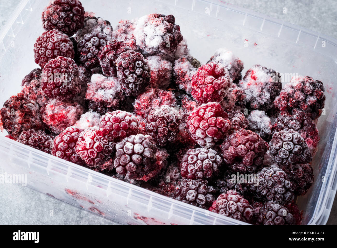 Frozen Blackberry in Plastic Box. Organic Fruit Stock Photo - Alamy