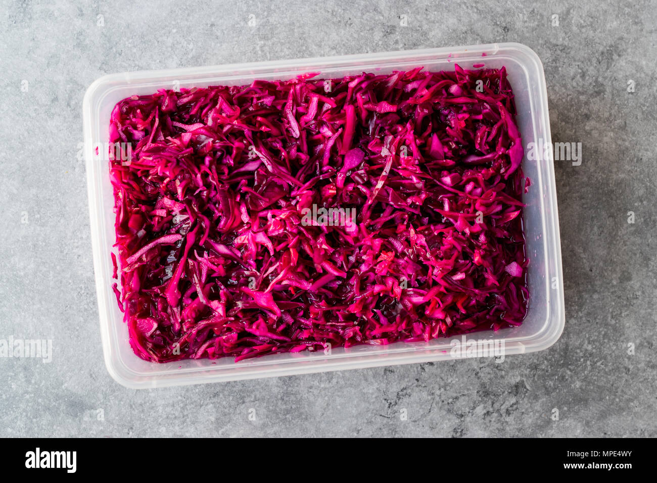 Shredded Red Cabbage Salad in Plastic bowl. / Pickle. Organic Food ...