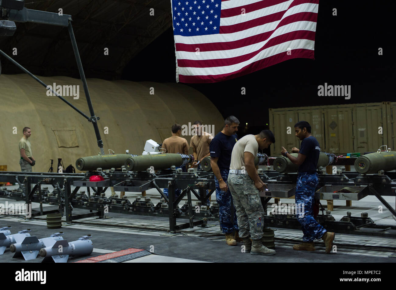 Members of the Royal Australian Air Force and U.S. Air Force construct ...