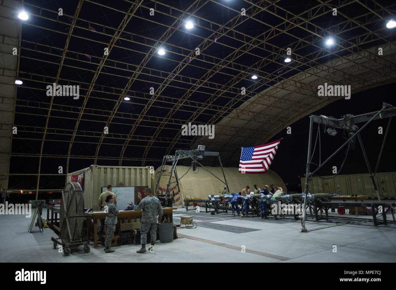 Members of the Royal Australian Air Force and U.S. Air Force construct ...