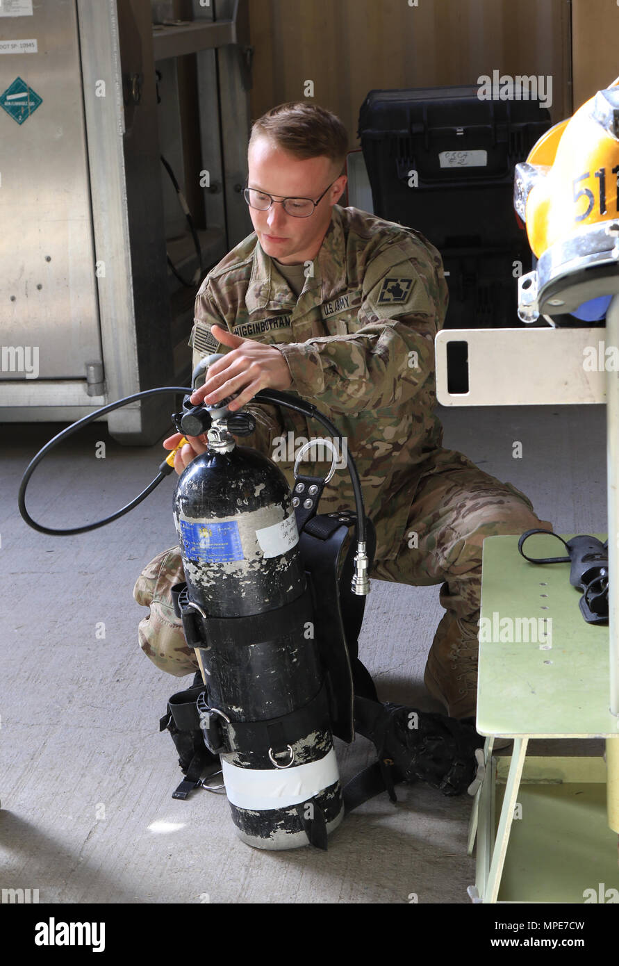CAMP PATRIOT, Kuwait — Spc. Michael Higginbotham, a Salvage Diver Board ...