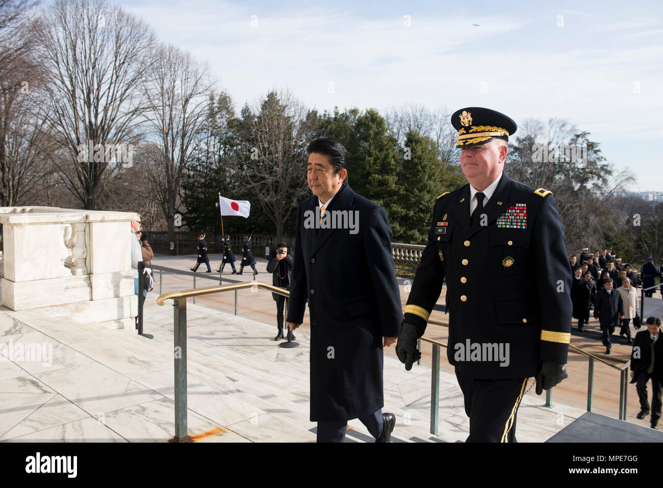 Shinzo Abe, left, prime minster of Japan, is escorted by Maj. Gen. Mark ...