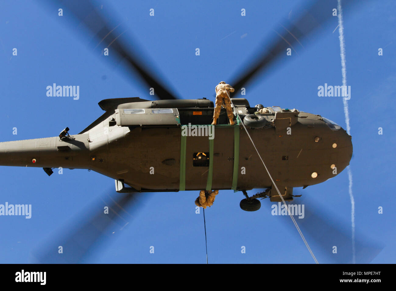 Soldiers rappel from a UH-60 Black Hawk helicopter at Fort Bliss, Texas ...
