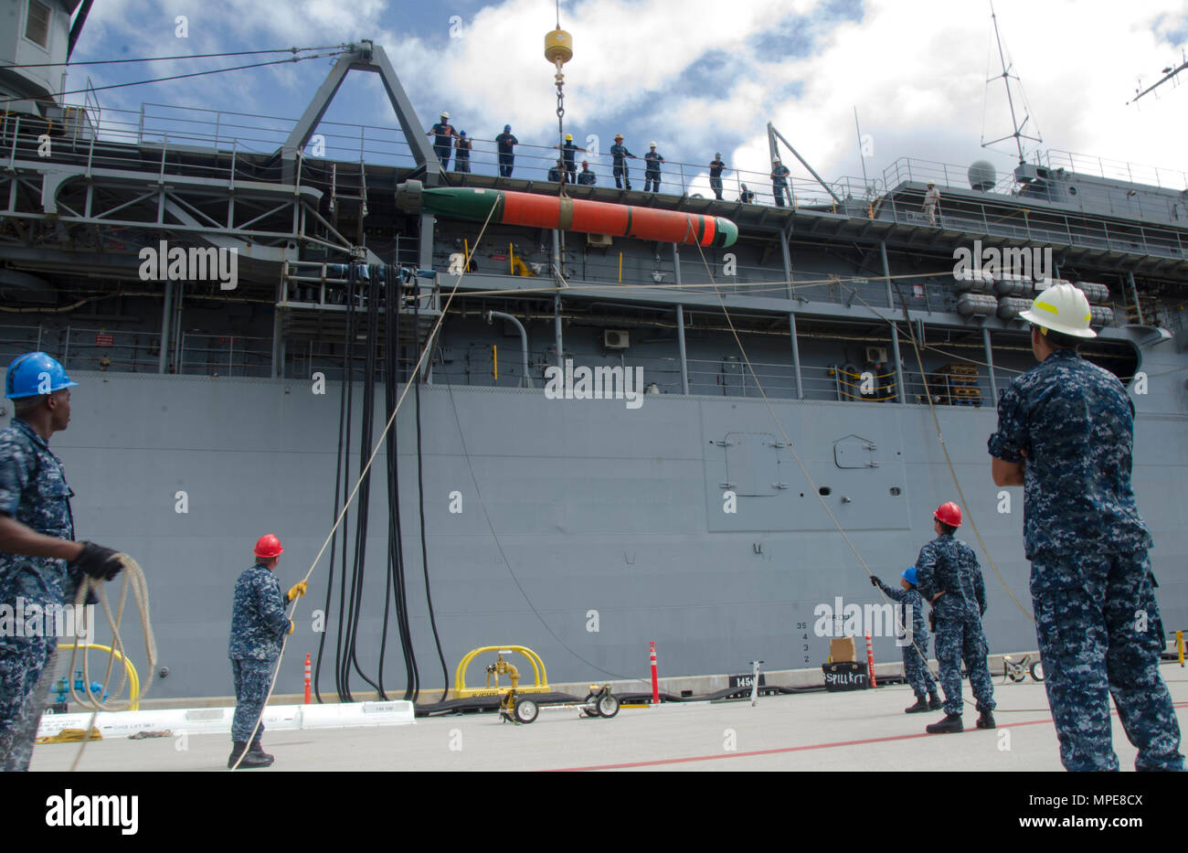 170210-N-DA434-172 SANTA RITA, Guam (Feb. 10, 2017) Sailors assigned to ...