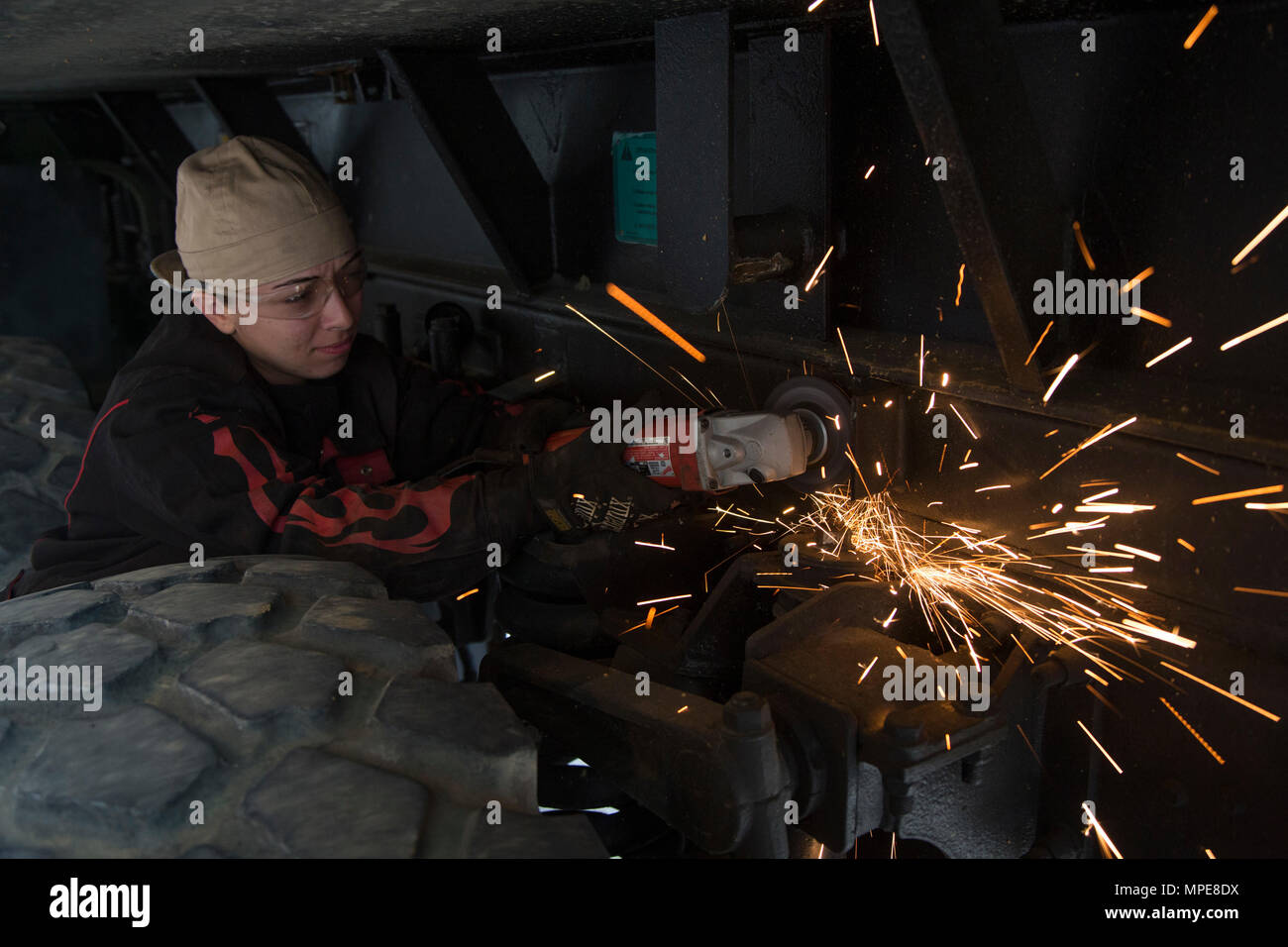 U.S. Marine Corps Cpl. Jessica Pak with heavy equipment maintenance ...