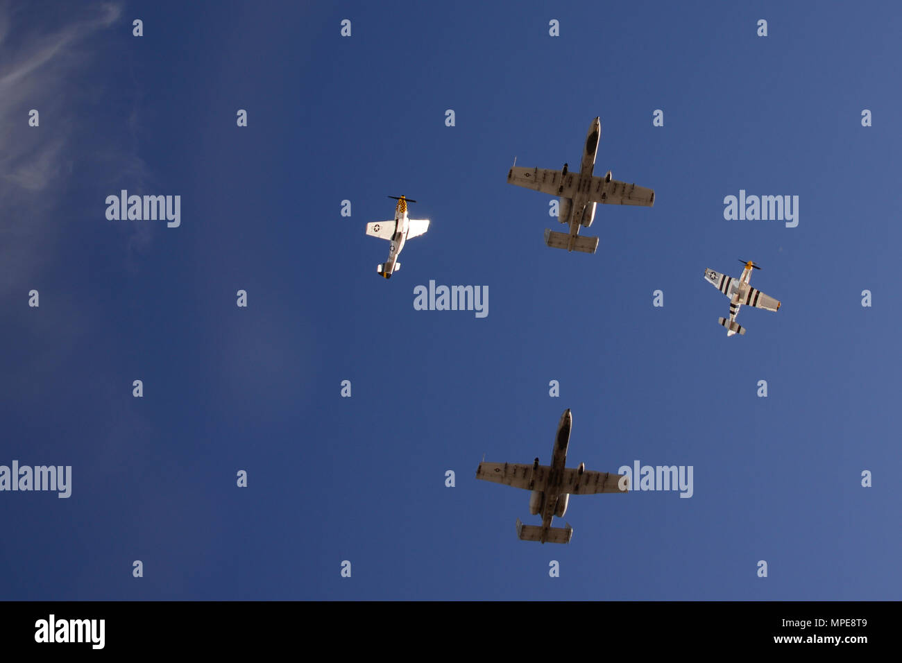 Two U.S. Air Force A-10C Thunderbolt II's, and two P-51 Mustang's fly ...