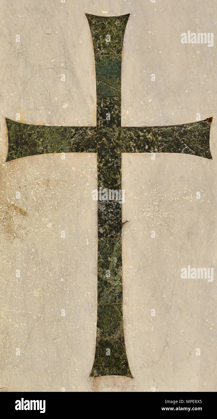Christian religious symbol, ancient medieval cross inlay in a marble ...