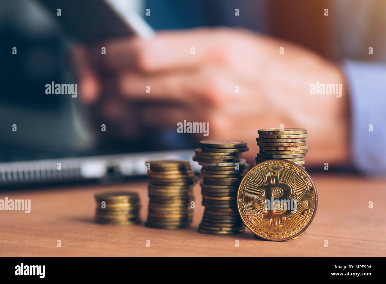 Bitcoin cryptocurrency trader, business person using modern technology ...