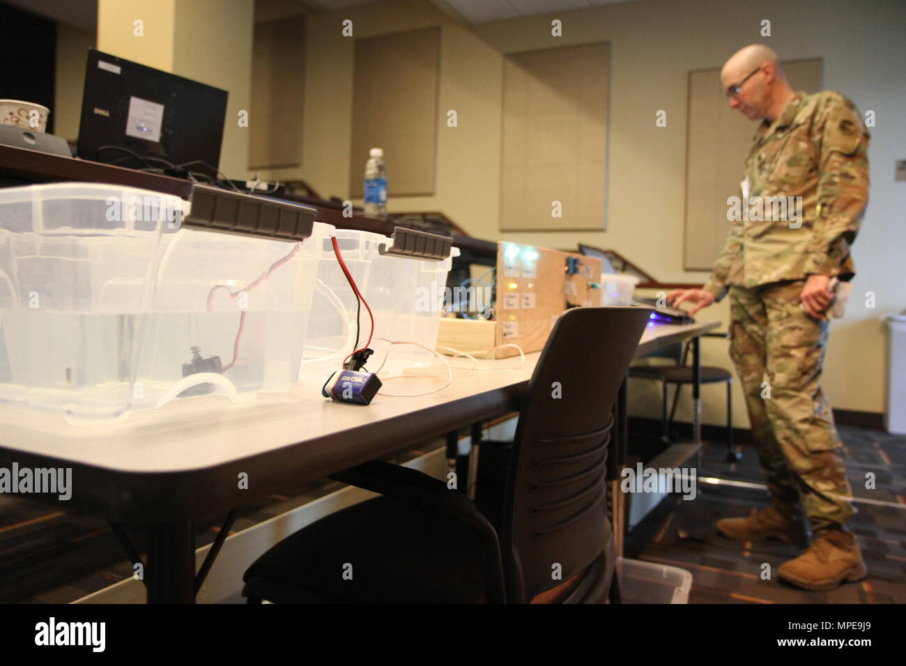 U.S. Army Lt. Col. Rhodes prepares to simulate how a cyber attacker ...