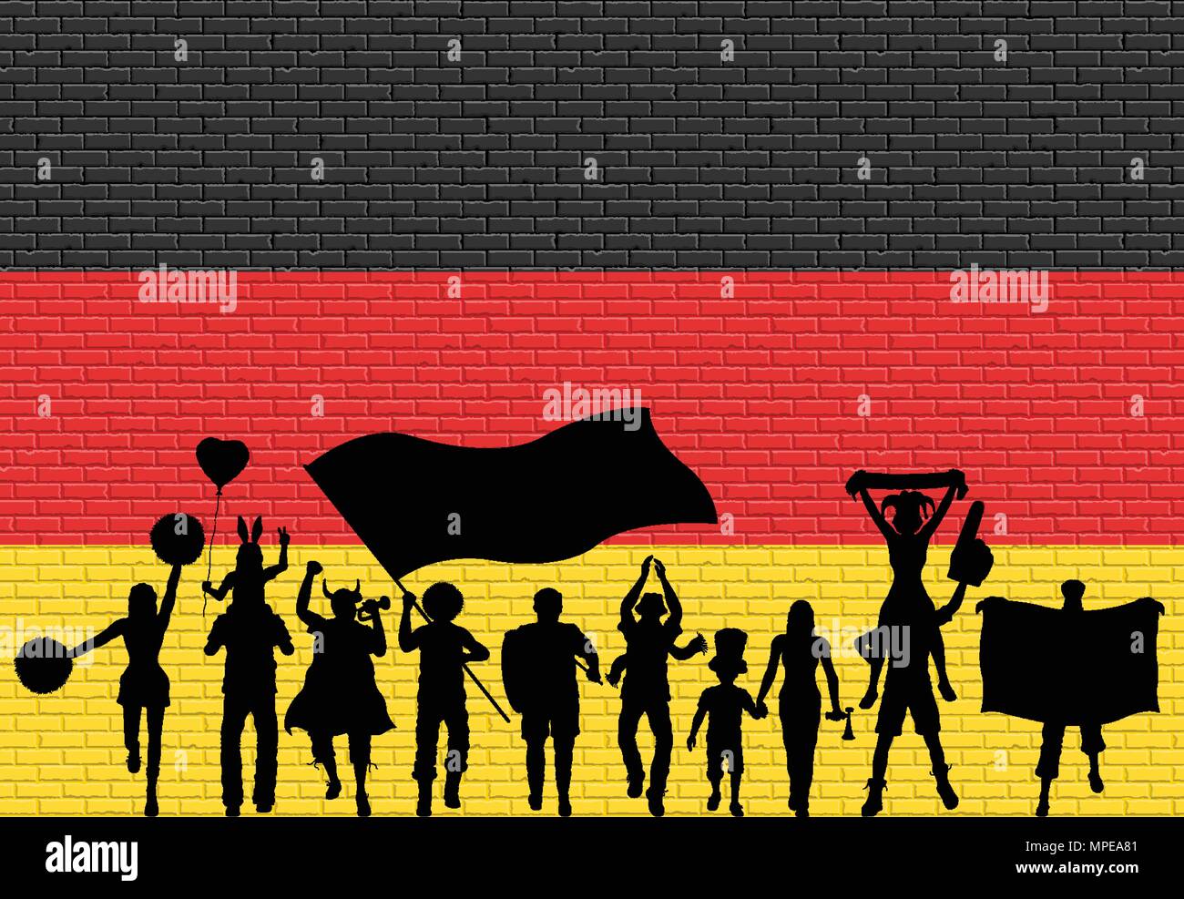German supporter silhouette in front of brick wall with Germany flag ...
