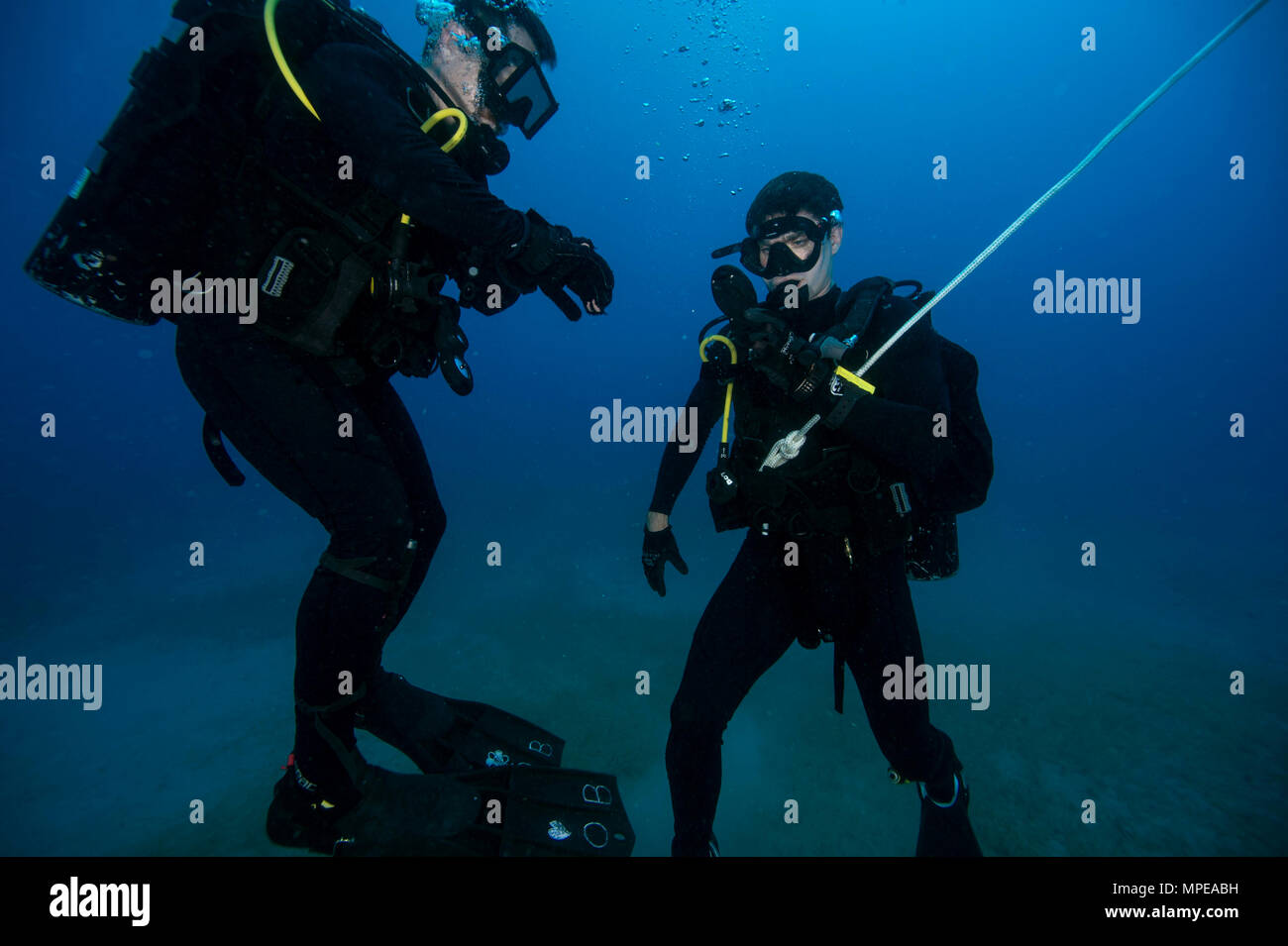 Construction Electrician 2nd Class Ben Coulson, right, and Chief ...