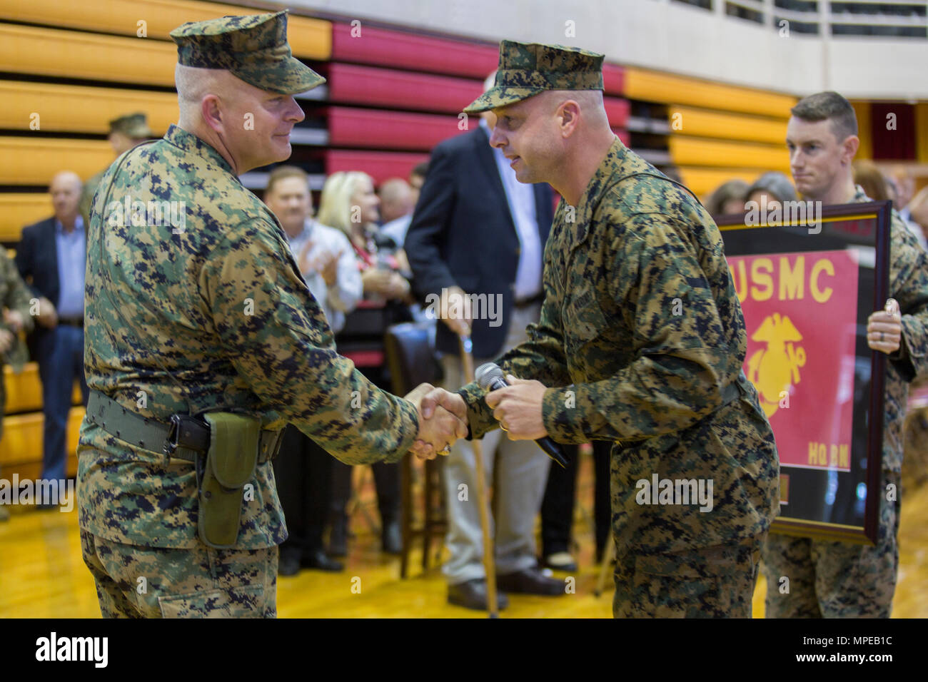 U.S. Marine Corps Lt. Col. John C. Golden, left, off going commanding ...