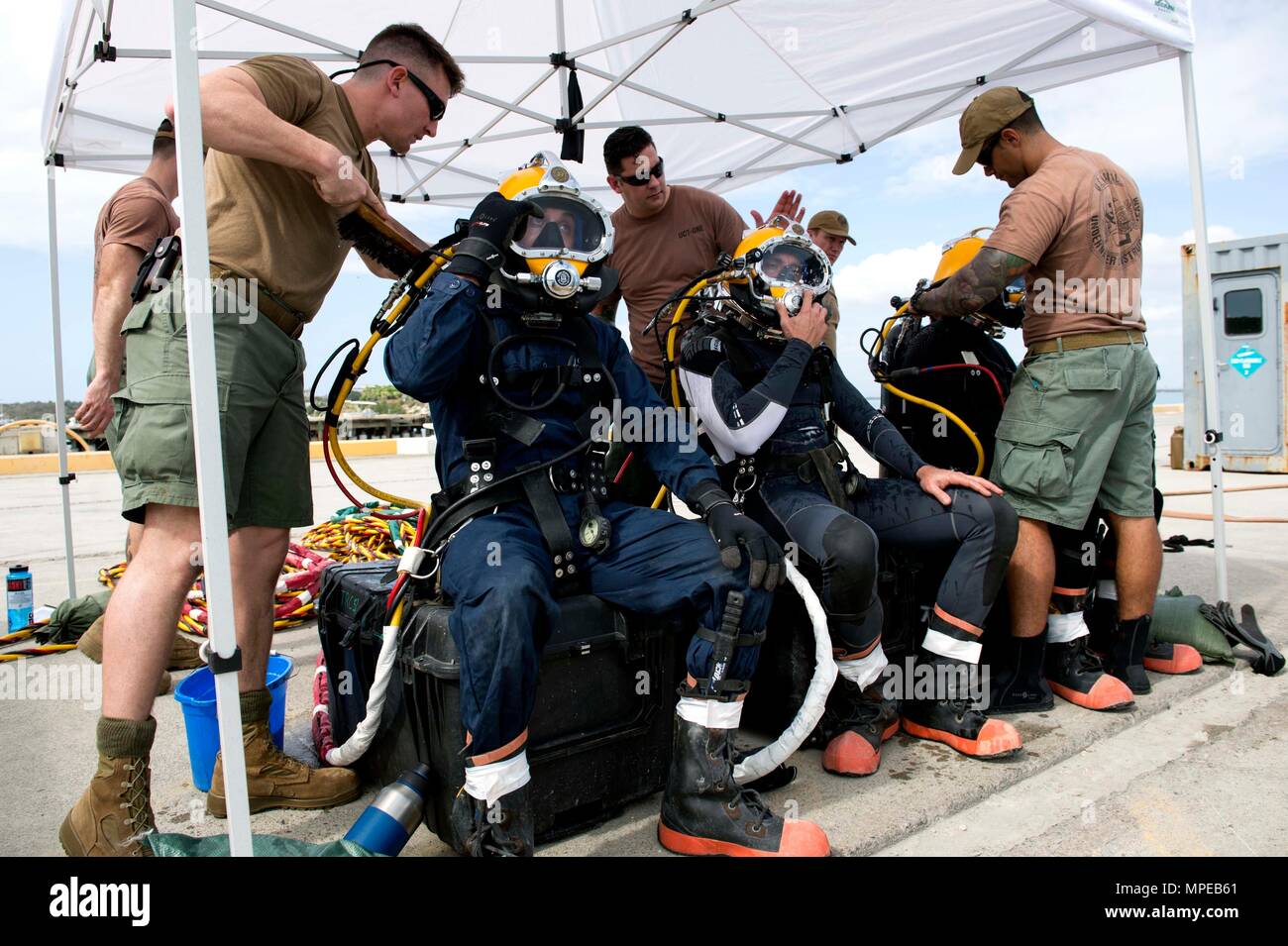 Navy Sailors assigned to Underwater Construction Team (UCT) 1, conduct ...
