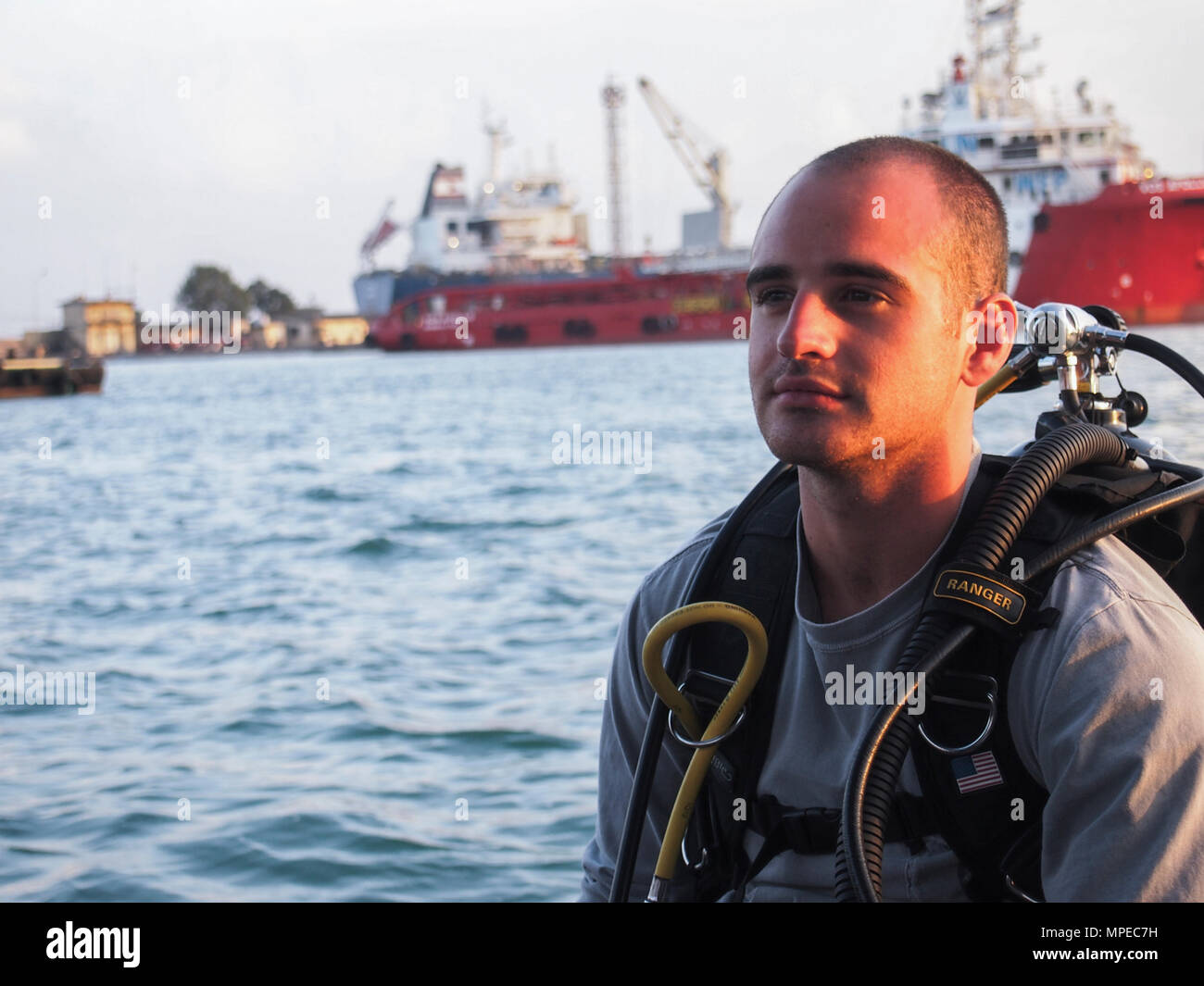 U.S. Navy Explosive Ordinance Disposal Mobility Unit (EODMU) personnel ...