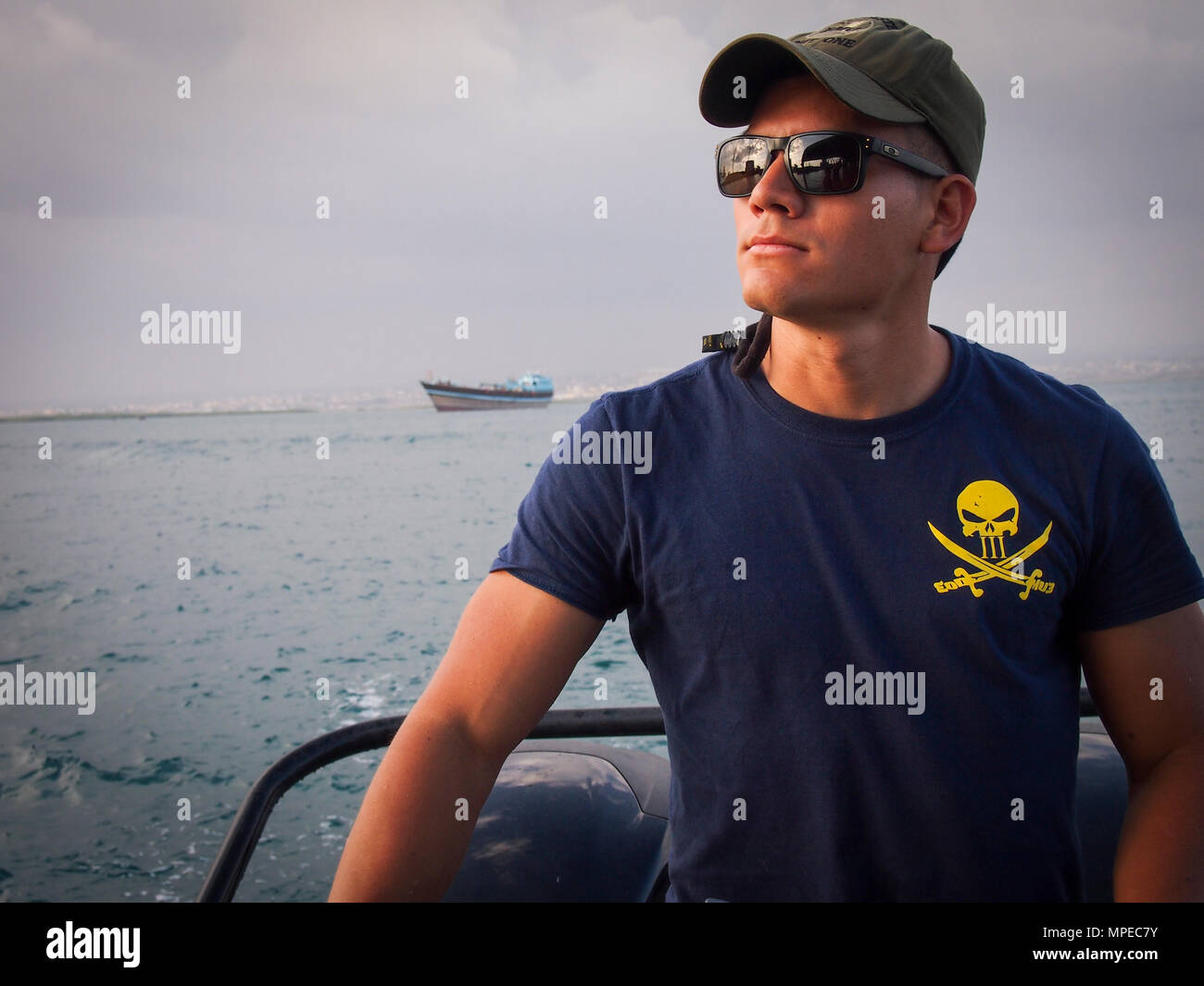 U.S. Navy Explosive Ordinance Disposal Mobility Unit (EODMU) personnel ...