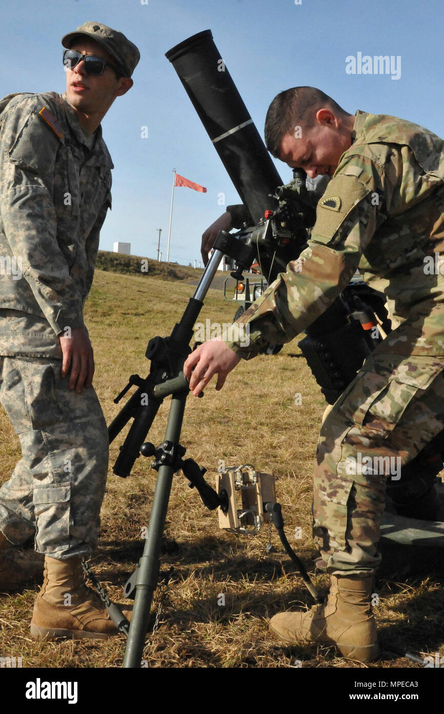 Spc. Exavier Serles and Pvt. Jonathon Bagnall, mortarmen with the 2nd ...