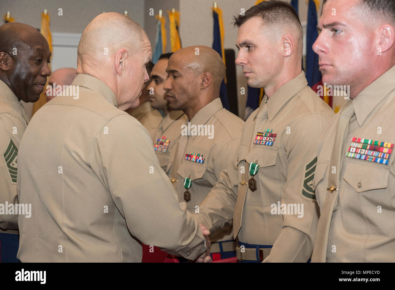 Commandant of the Marine Corps Gen. Robert B. Neller presents U.S ...