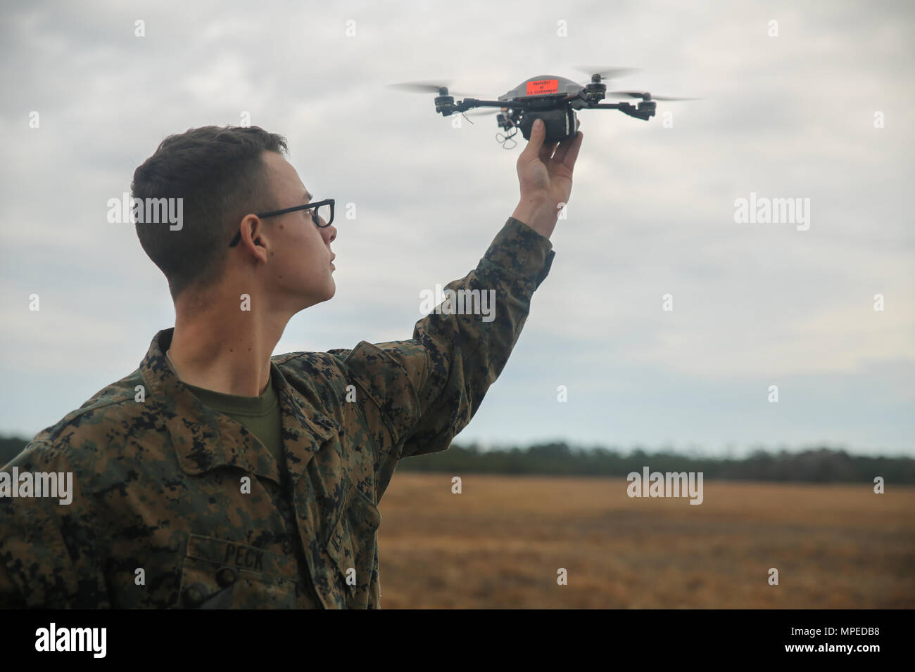 A Marine with Task Force Southwest prepares to launch the Instant Eye ...
