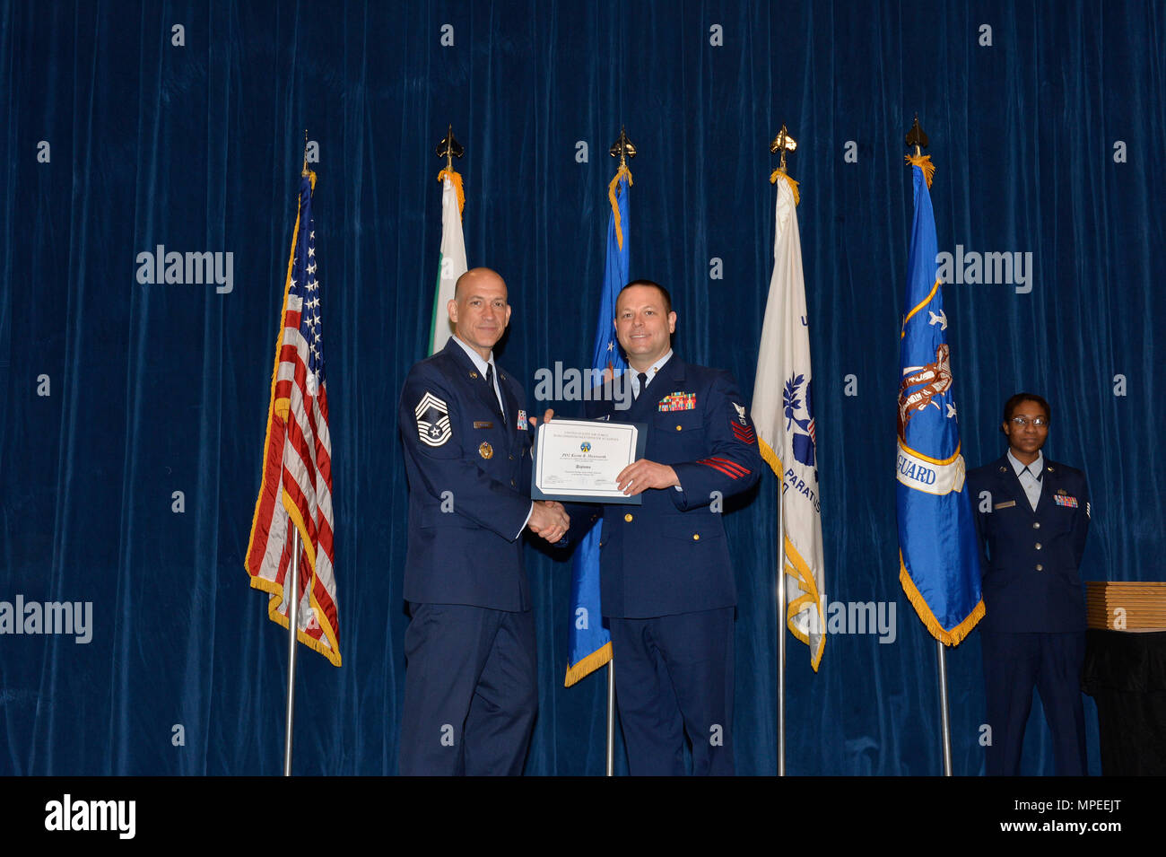 Petty Officer 1st Class Kevin Hoxworth, receives his diploma from NCO ...