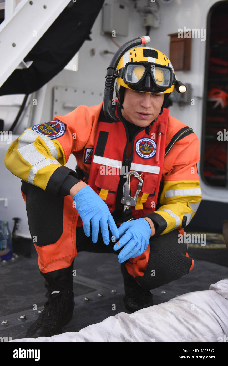 Petty Officer 3rd Class Kevin Peach, an aviation survival technician at ...