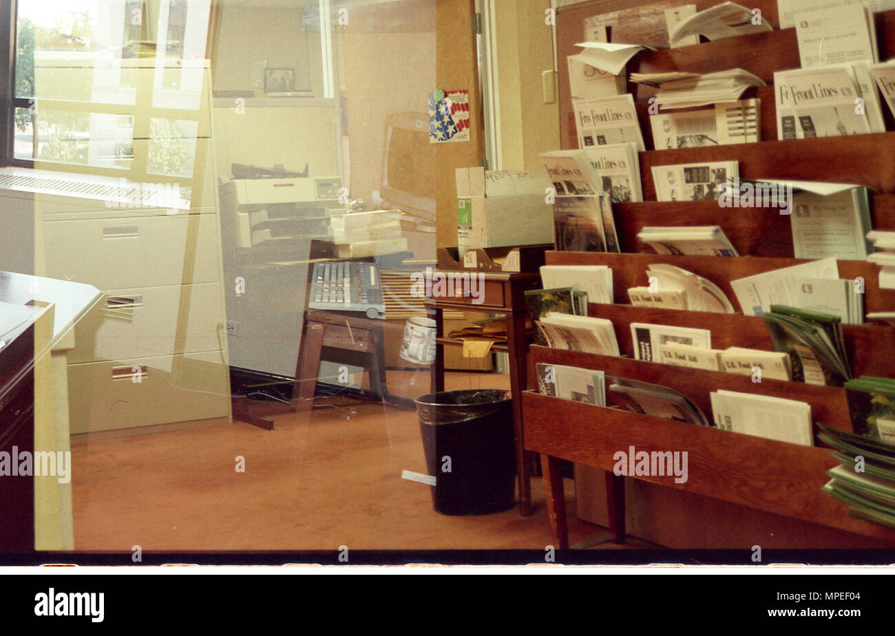 OFFICE SETTING AND A STAND FULL OF NEWSPAPERS Stock Photo - Alamy