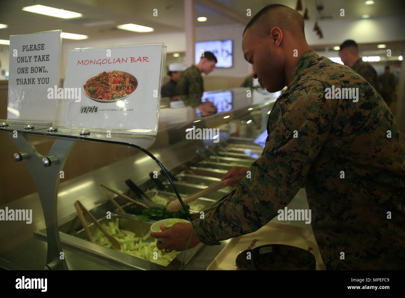 U.S. Marine Corps Staff Sgt. Michael Parrish, a warehouse clerk with ...