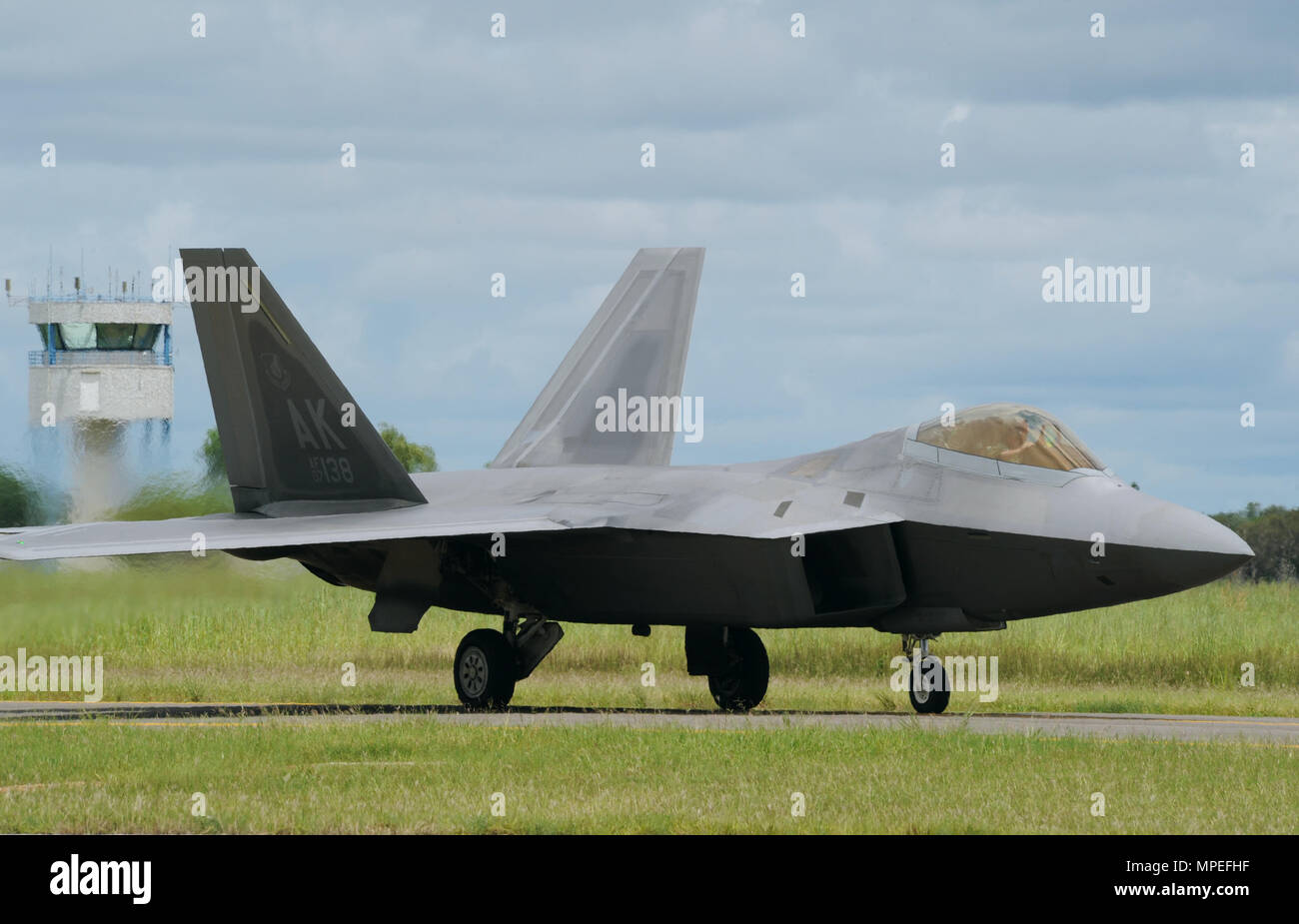 A U.S. Air Force F-22 Raptor assigned to the 90th Fighter Squadron ...