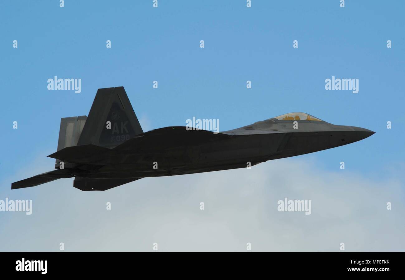 A U.S. Air Force F-22 Raptor assigned to the 90th Fighter Squadron ...