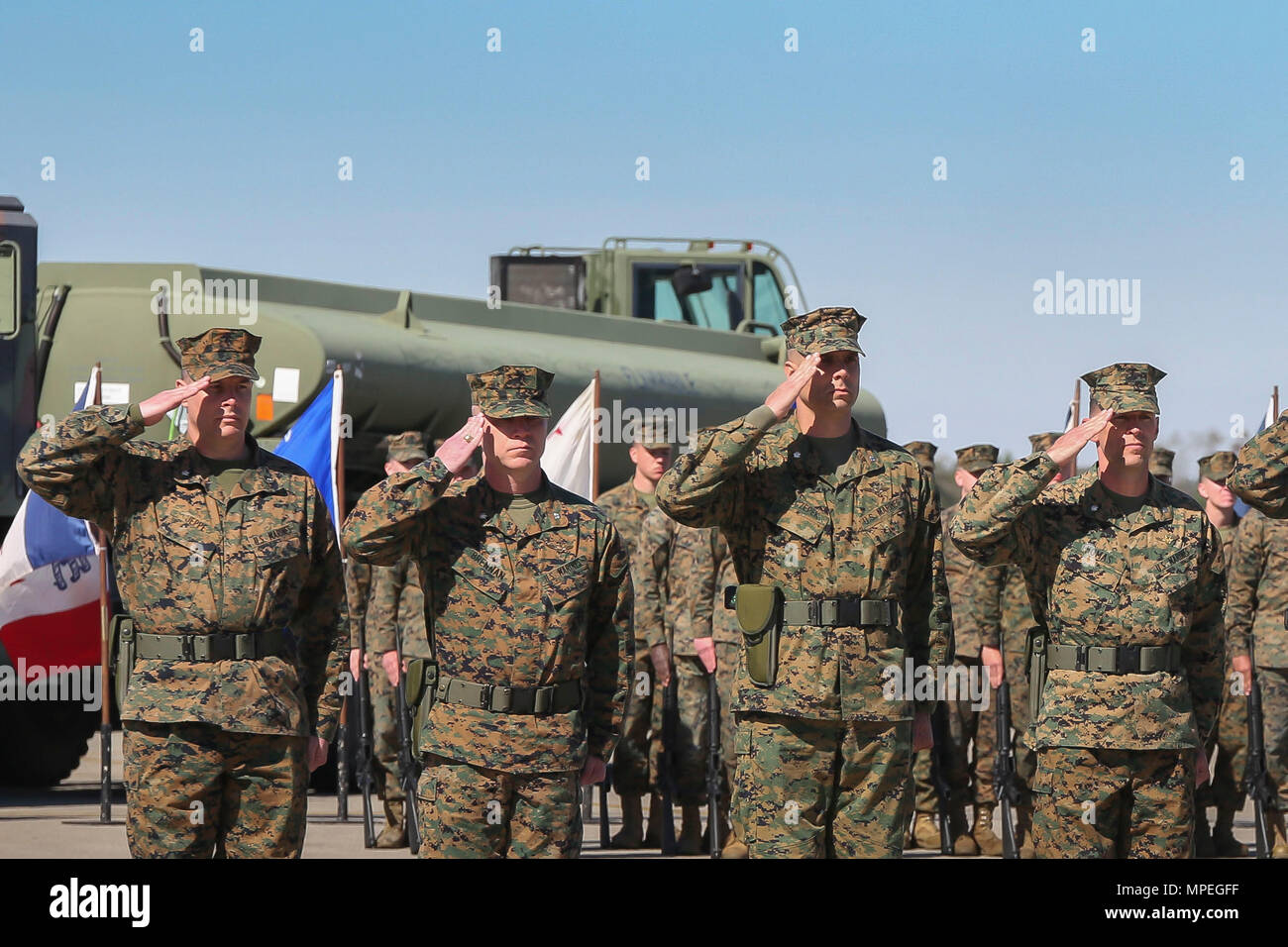 Marines salute the commanding officer of Marine Aircraft Group 31 ...