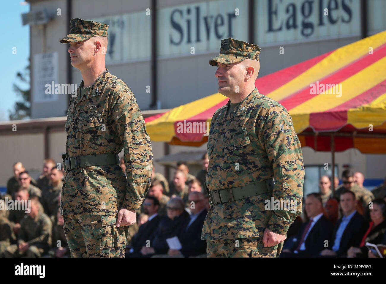 Col. Robert Cooper (left) and Col. Frank Latt (right) stand at ...