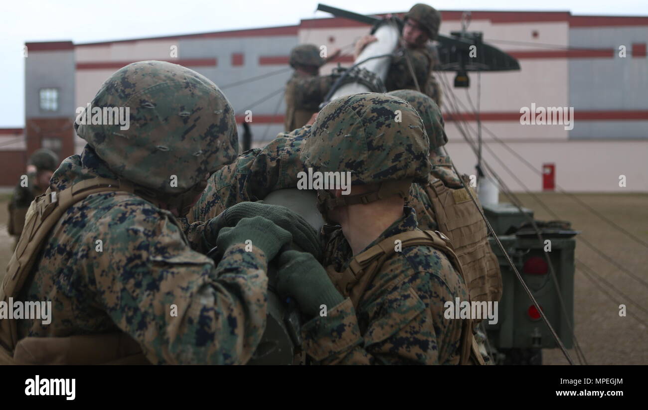 Marines with Combat Logistics Regiment 25 help set up a Tactical ...