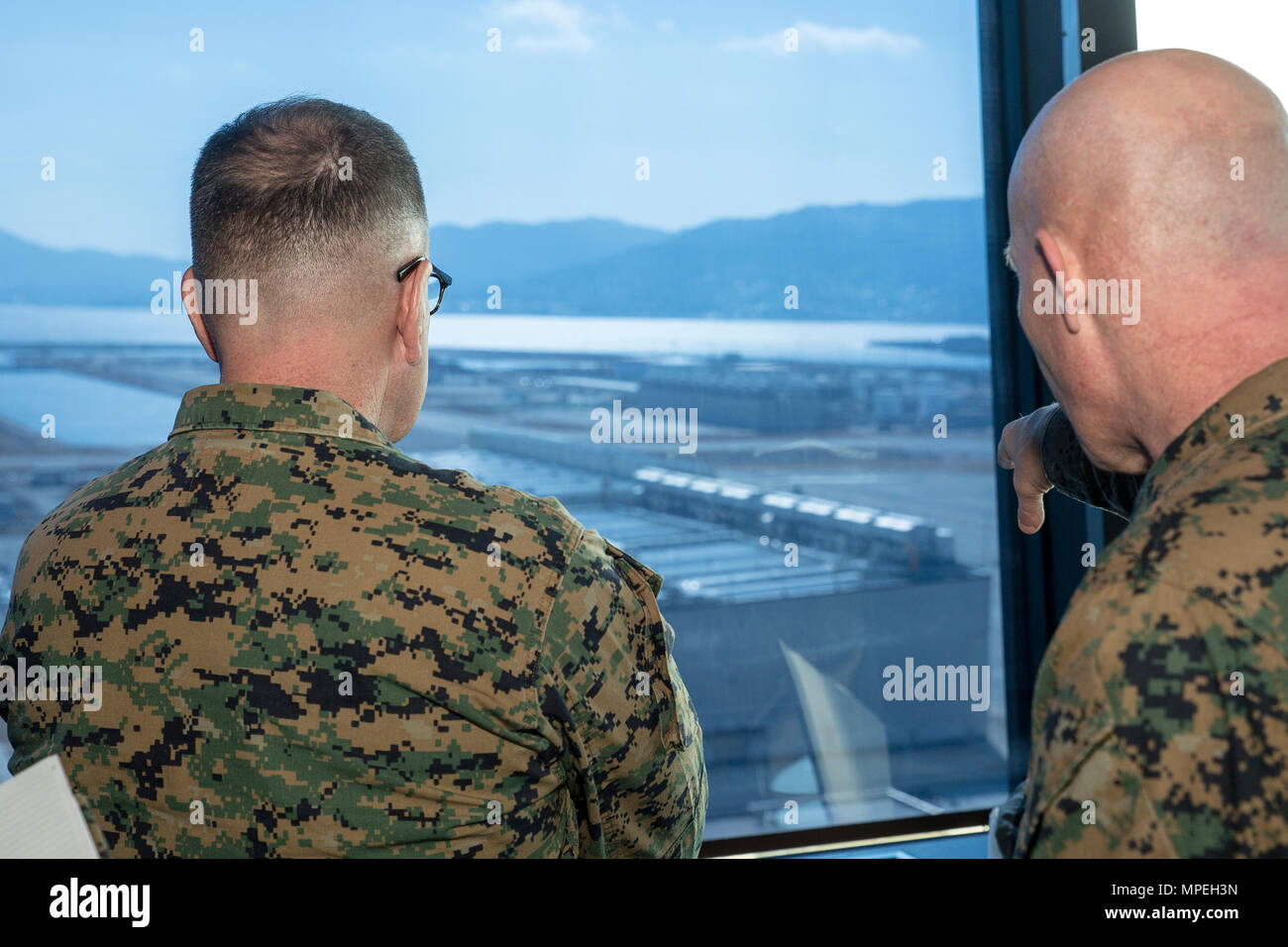 U.S. Marine Corps Col. Richard F. Fuerst, right, commanding officer of ...