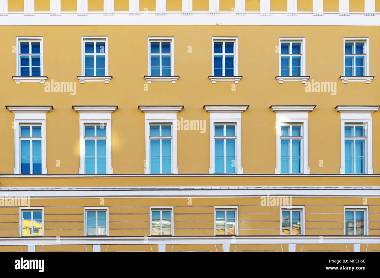 Yellow building facade in Sankt-Petersburg, Russia Stock Photo - Alamy