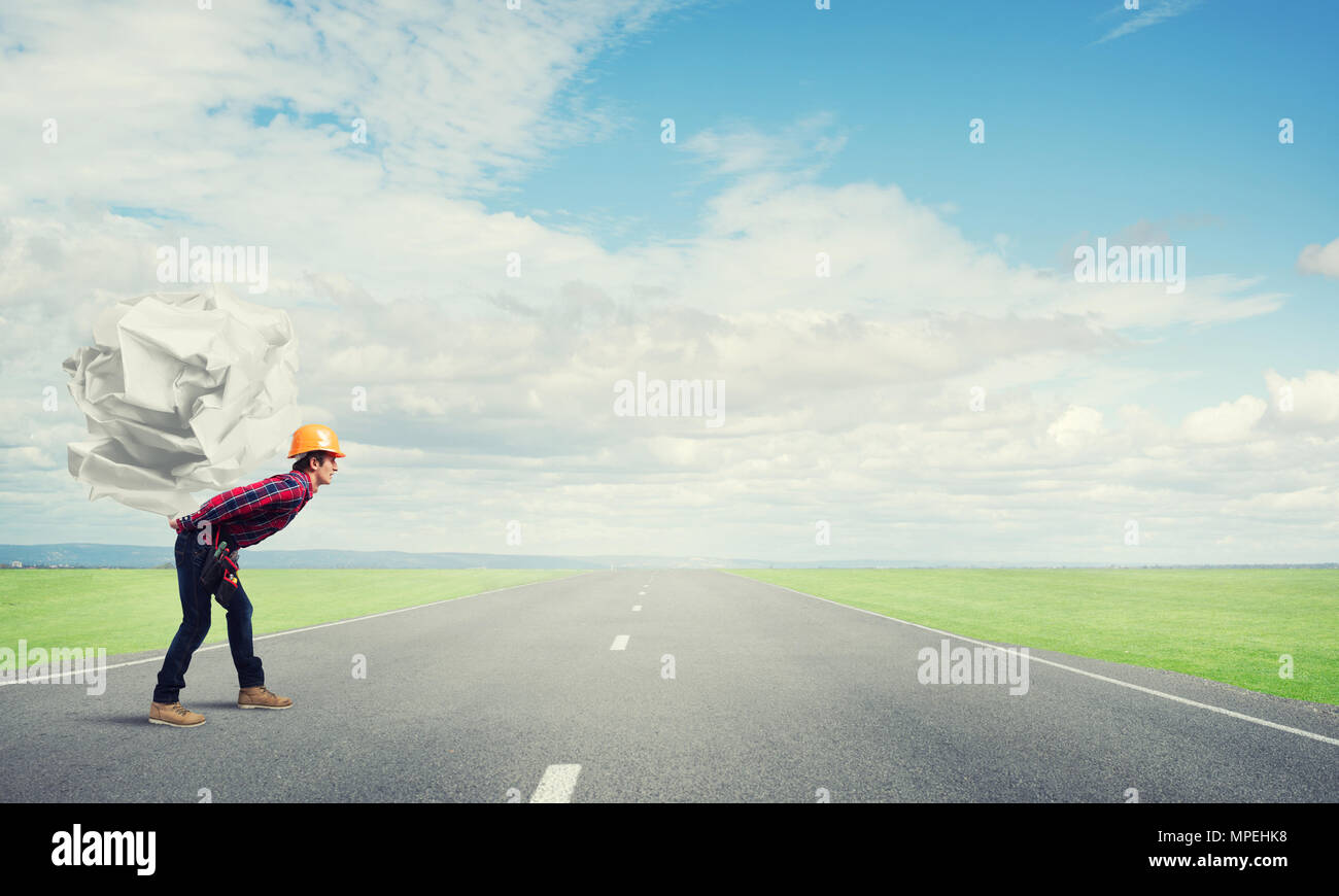 Engineer man carry load Stock Photo - Alamy